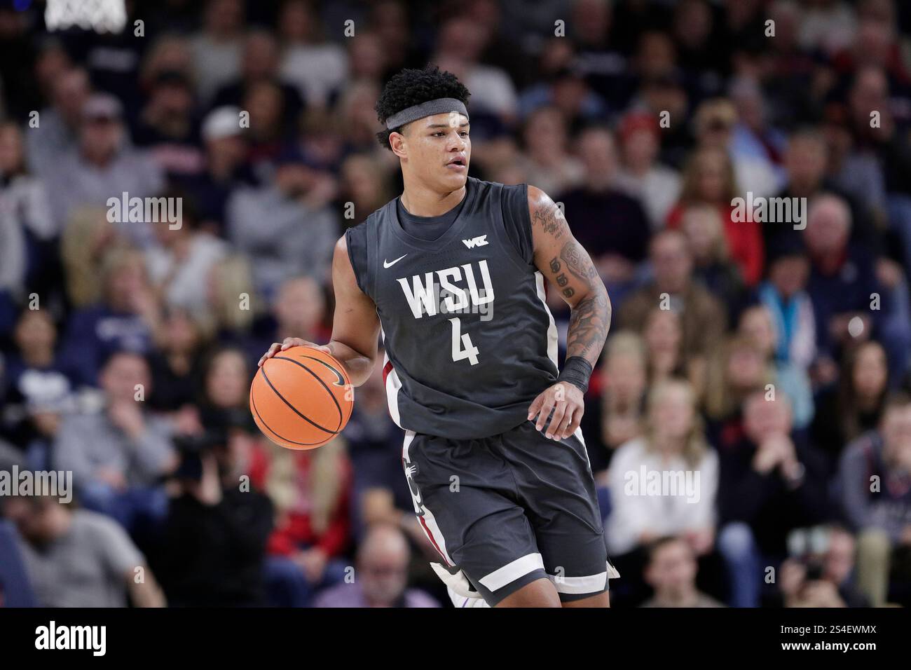 Washington State forward LeJuan Watts (4) controls the ball during the ...