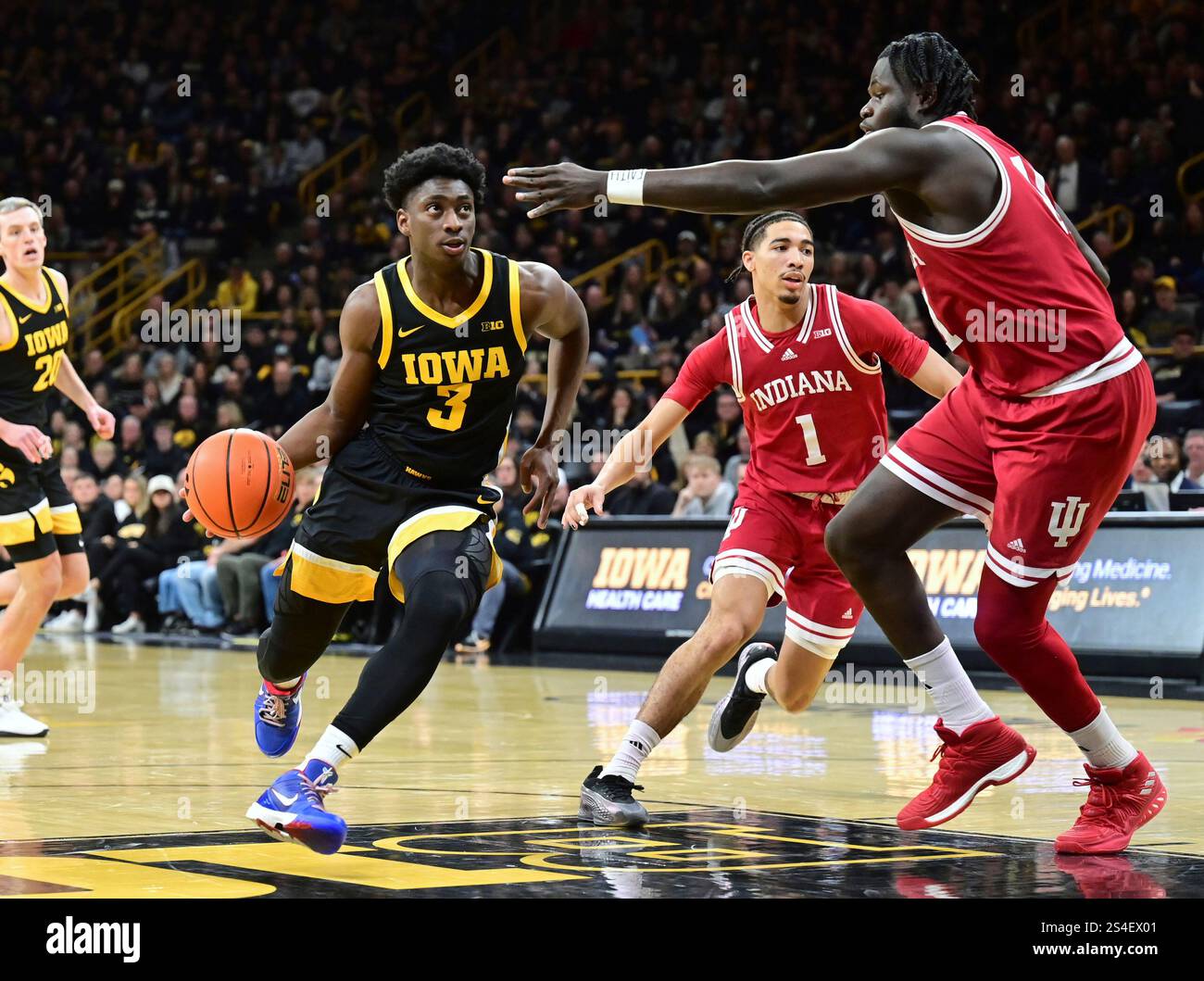 IOWA CITY, IA - JANUARY 11:Ipwa guard Drew Thelwell (3) drives to the ...