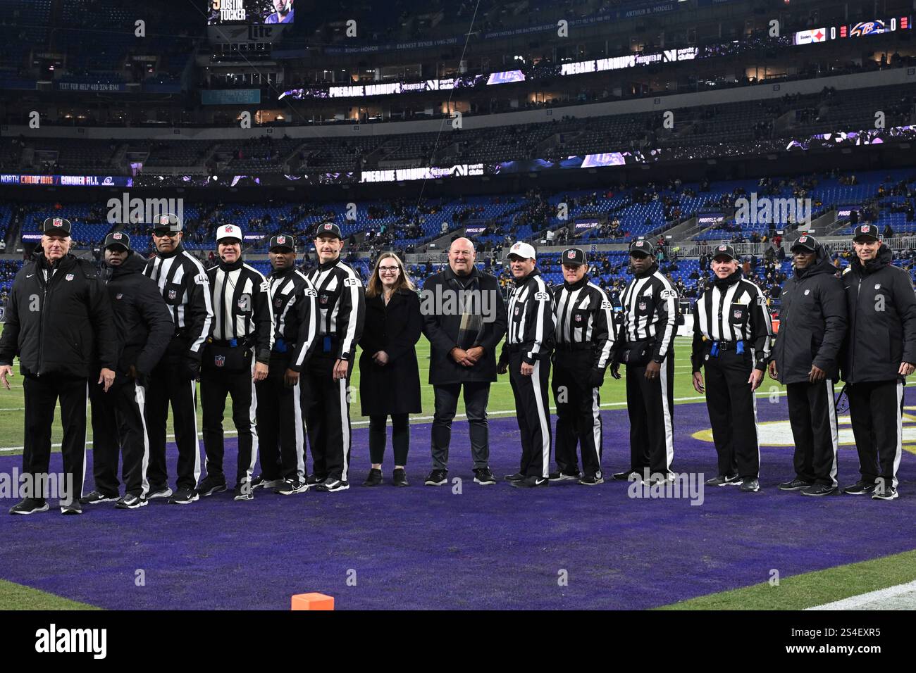 Uniformed officials pose for picture from left to right, down judge ...