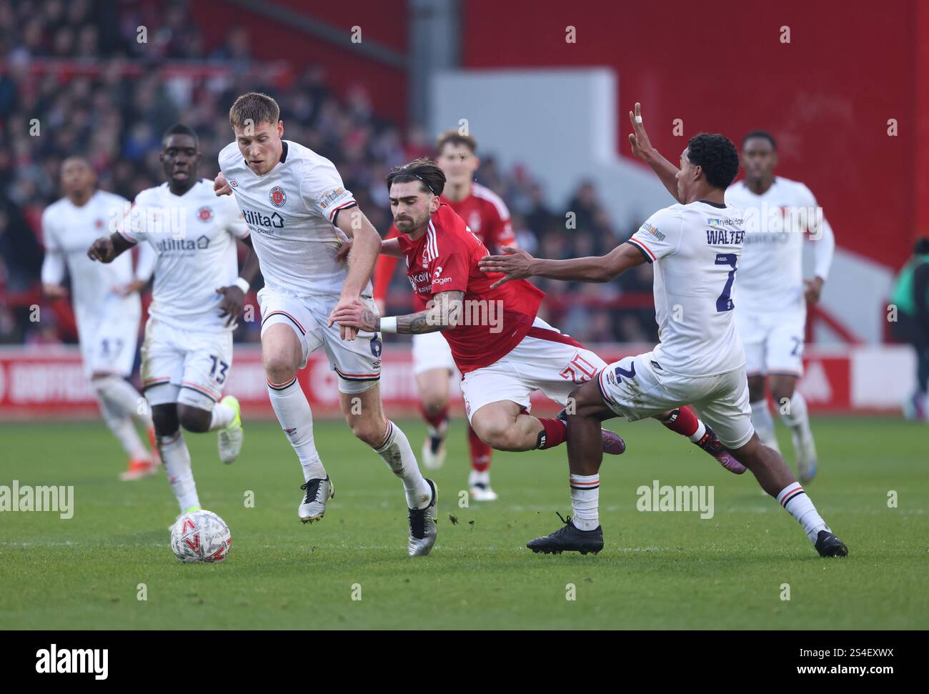 Nottingham, UK. 11th Jan, 2025. Mark McGuinness (LT) Jota Silva (NF ...