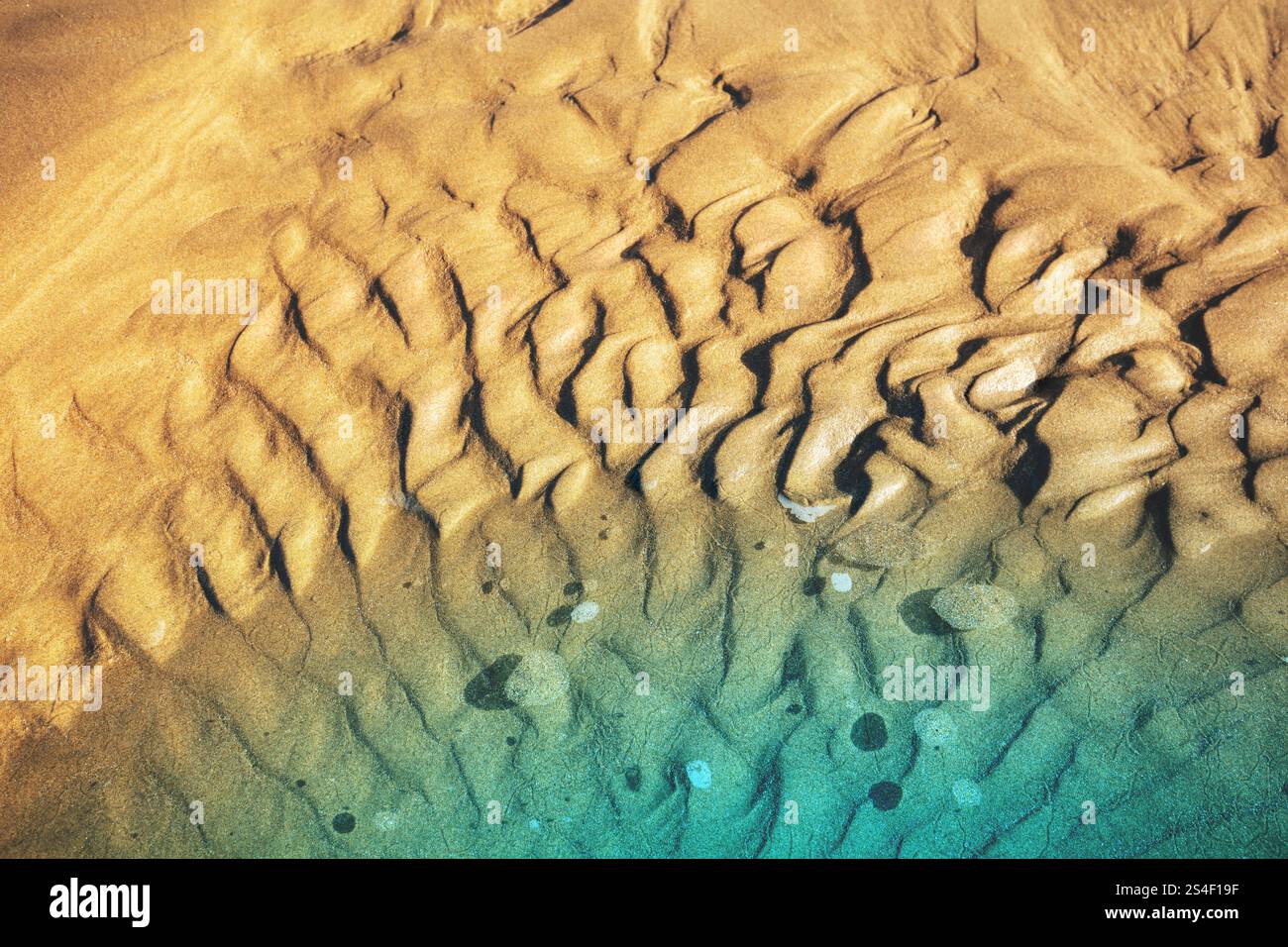 Abstract sandy beach background. The sand texture on the beach at low ...