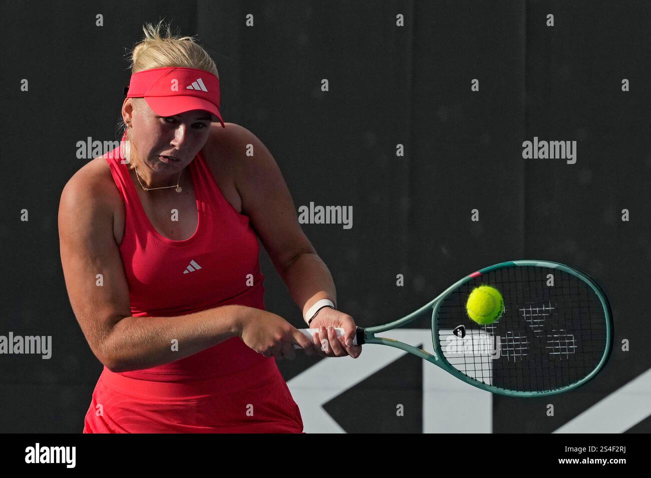 Clara Tauson of Denmark plays a backhand return to Linda Noskova of the ...
