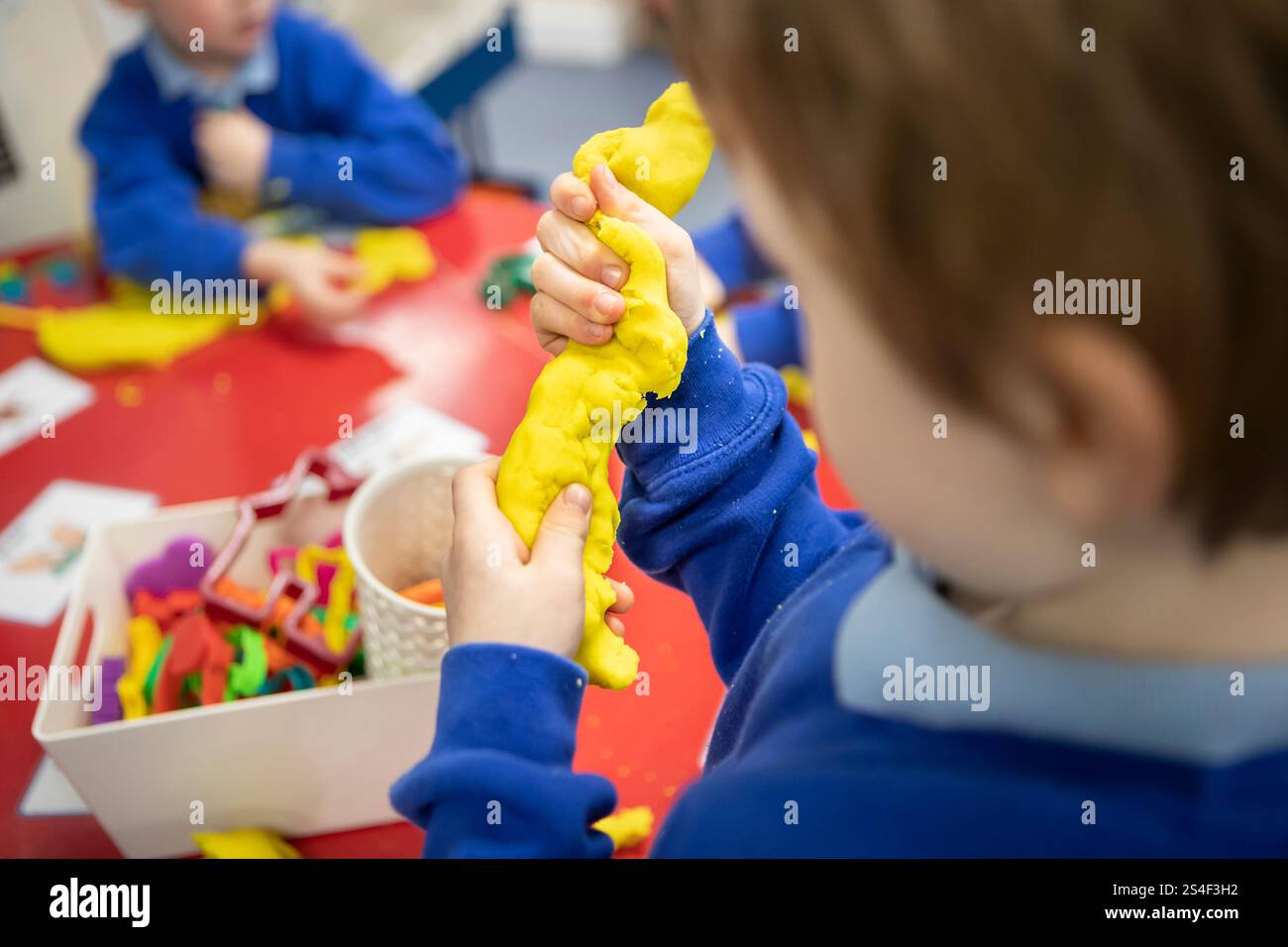 File photo dated 27/11/19 of school children during an Early Years ...