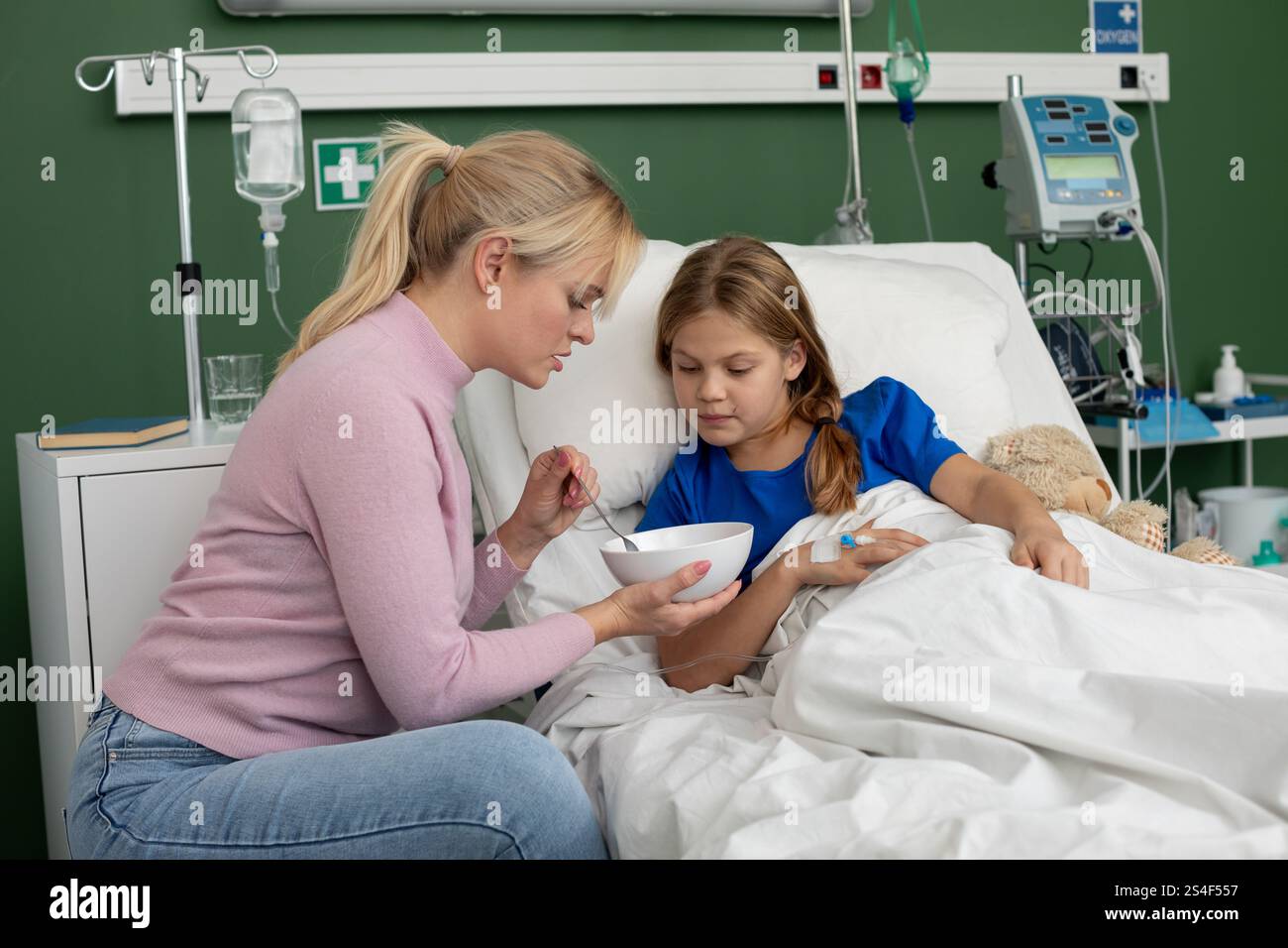 Comforting a Child in a Hospital Bed to Help Foster Emotional ...