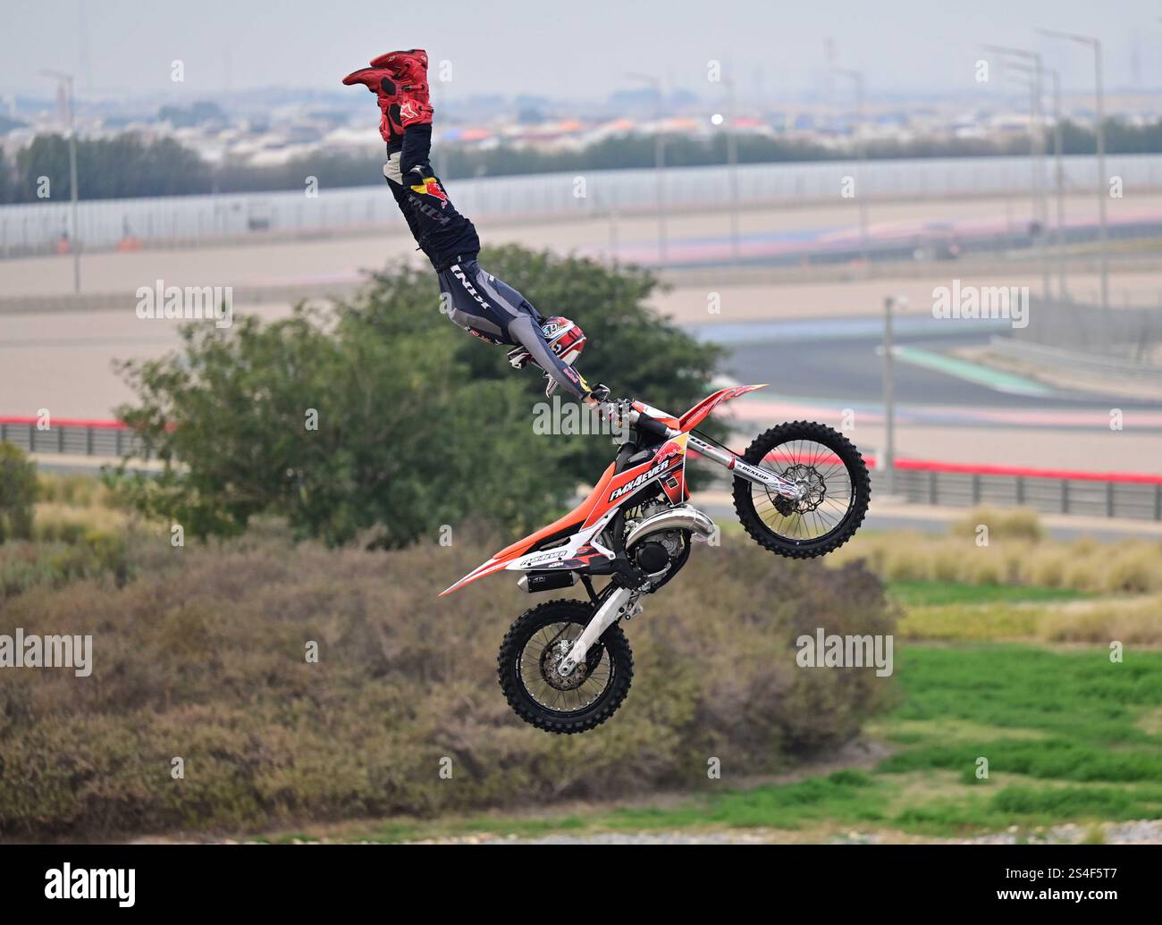 Ahmadi Governorate, Kuwait. 11th Jan, 2025. A biker performs during a ...