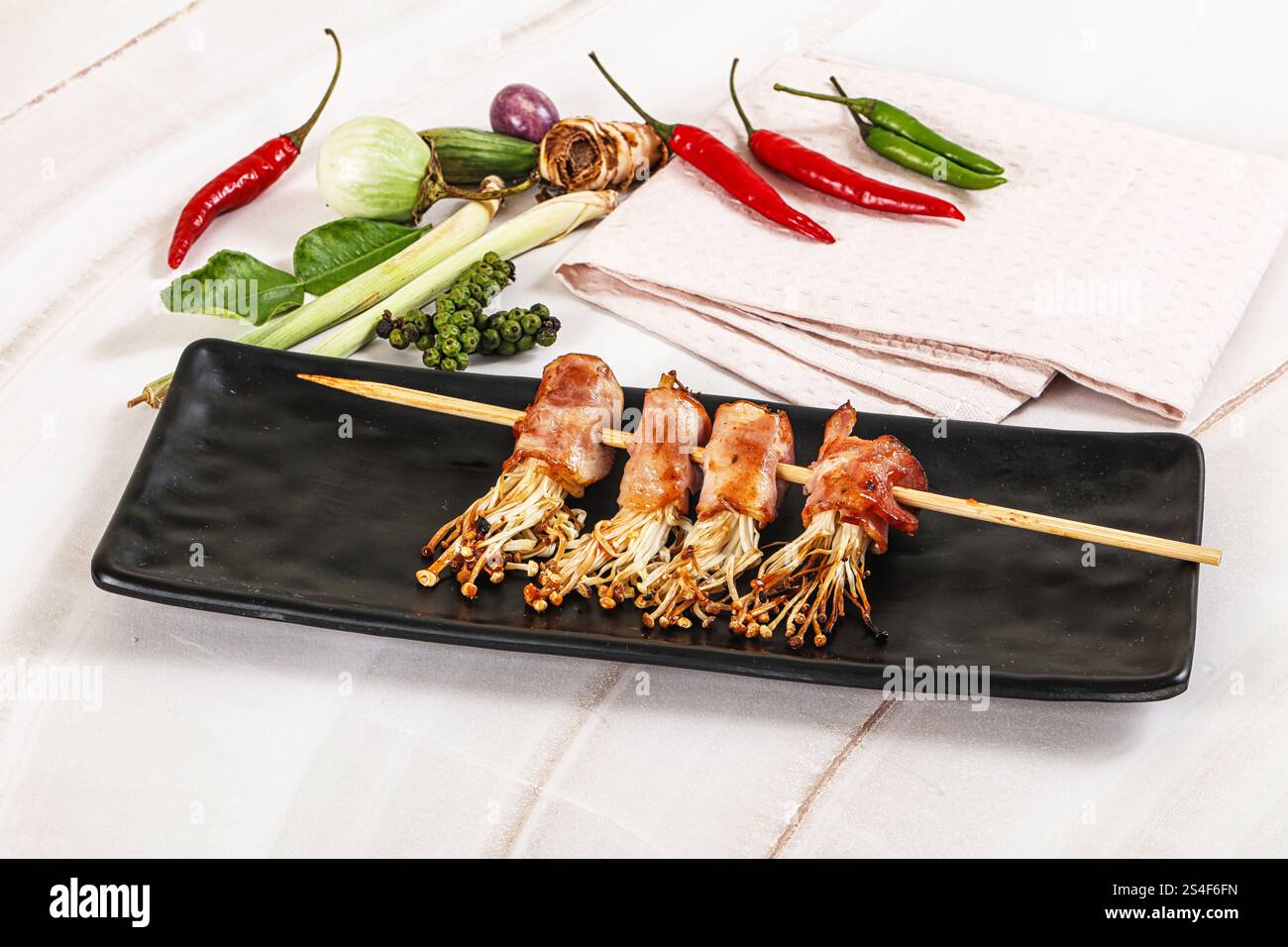 Thai Street foof satay with bacon and mushroom enoki skewer Stock Photo ...
