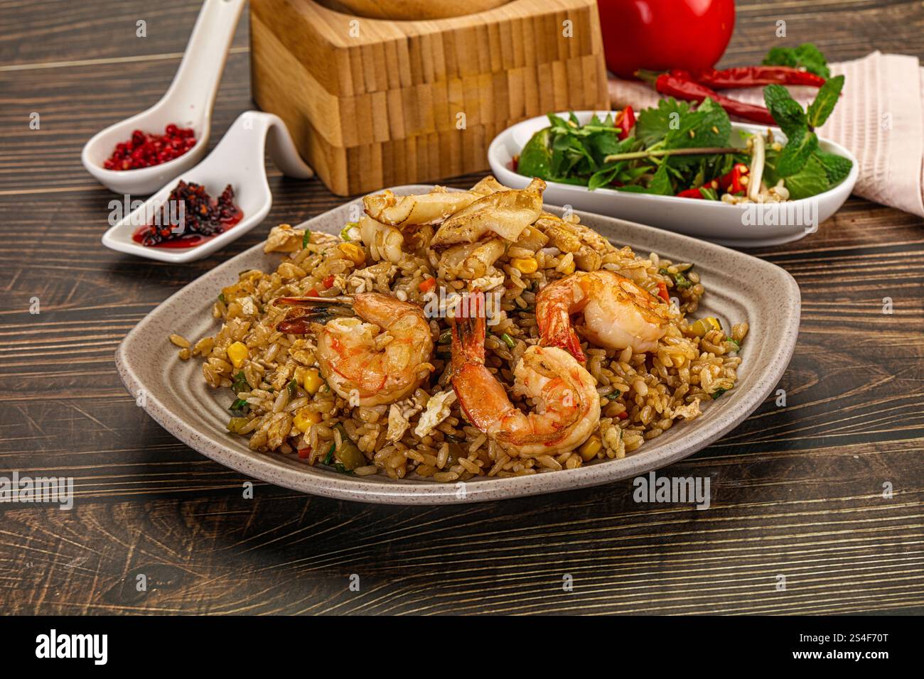 Vietnamese traditional fried rice with prawn and squid - Kom Ran Stock ...