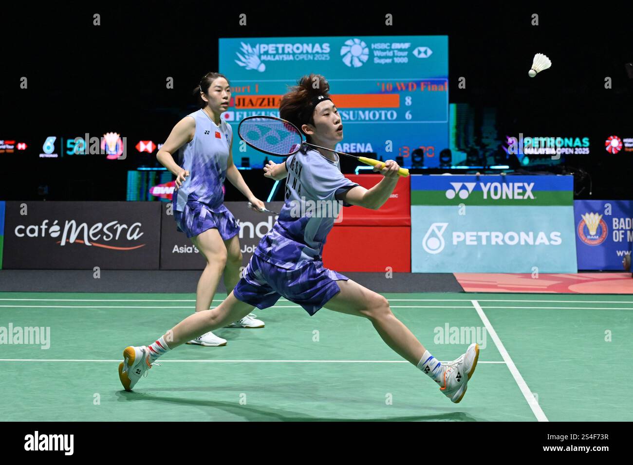 Kuala Lumpur, Malaysia. 12th Jan, 2025. Jia Yifan/Zhang Shuxian (R) of China compete during the ...