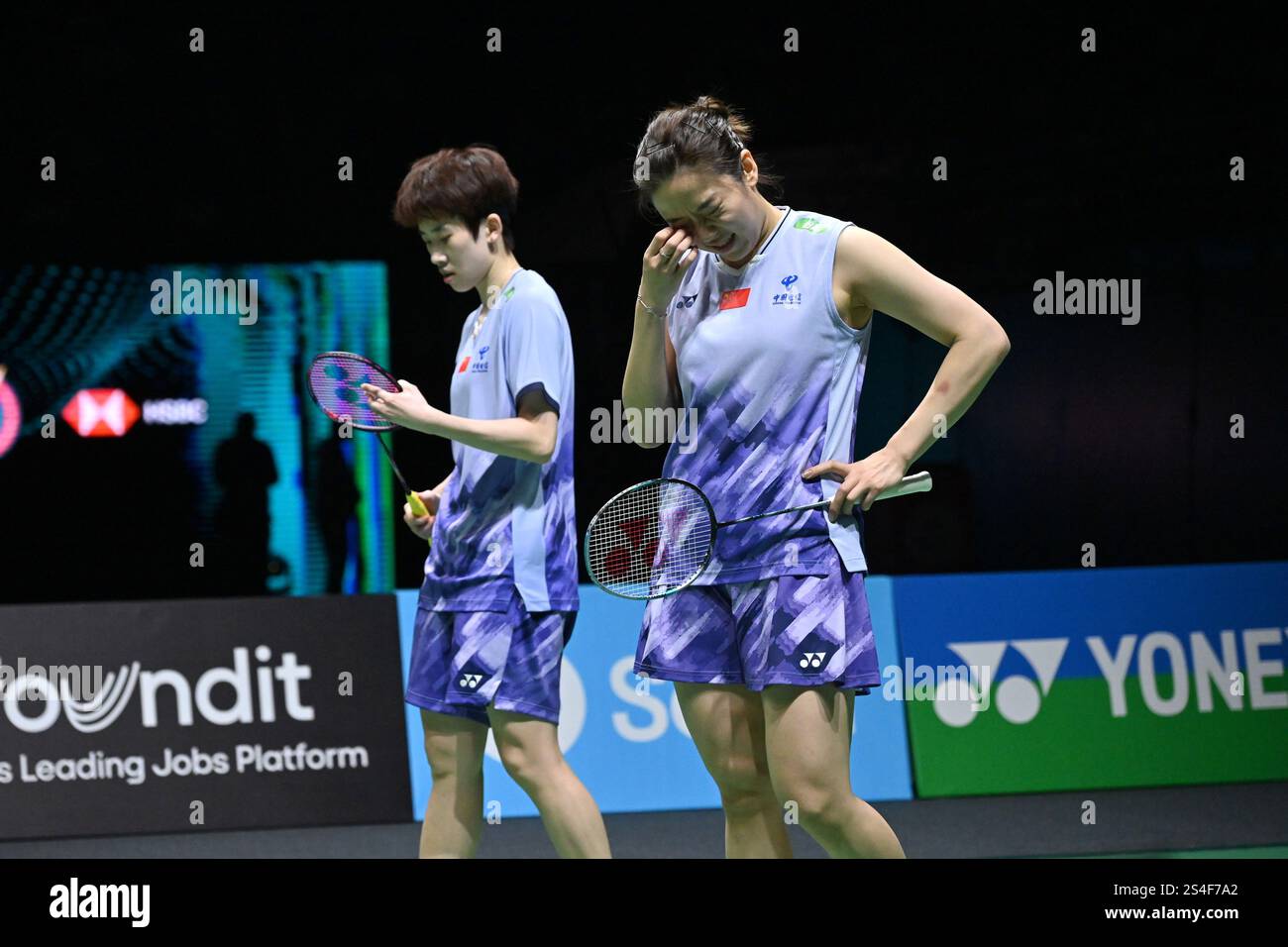 Kuala Lumpur, Malaysia. 12th Jan, 2025. Jia Yifan (R)/Zhang Shuxian of China react during the ...