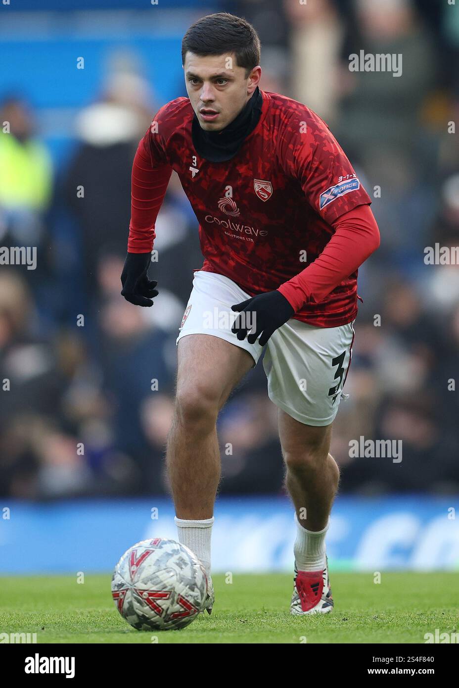 London, UK. 11th Jan, 2025. Adam Lewis of Morecambe warms up before the ...