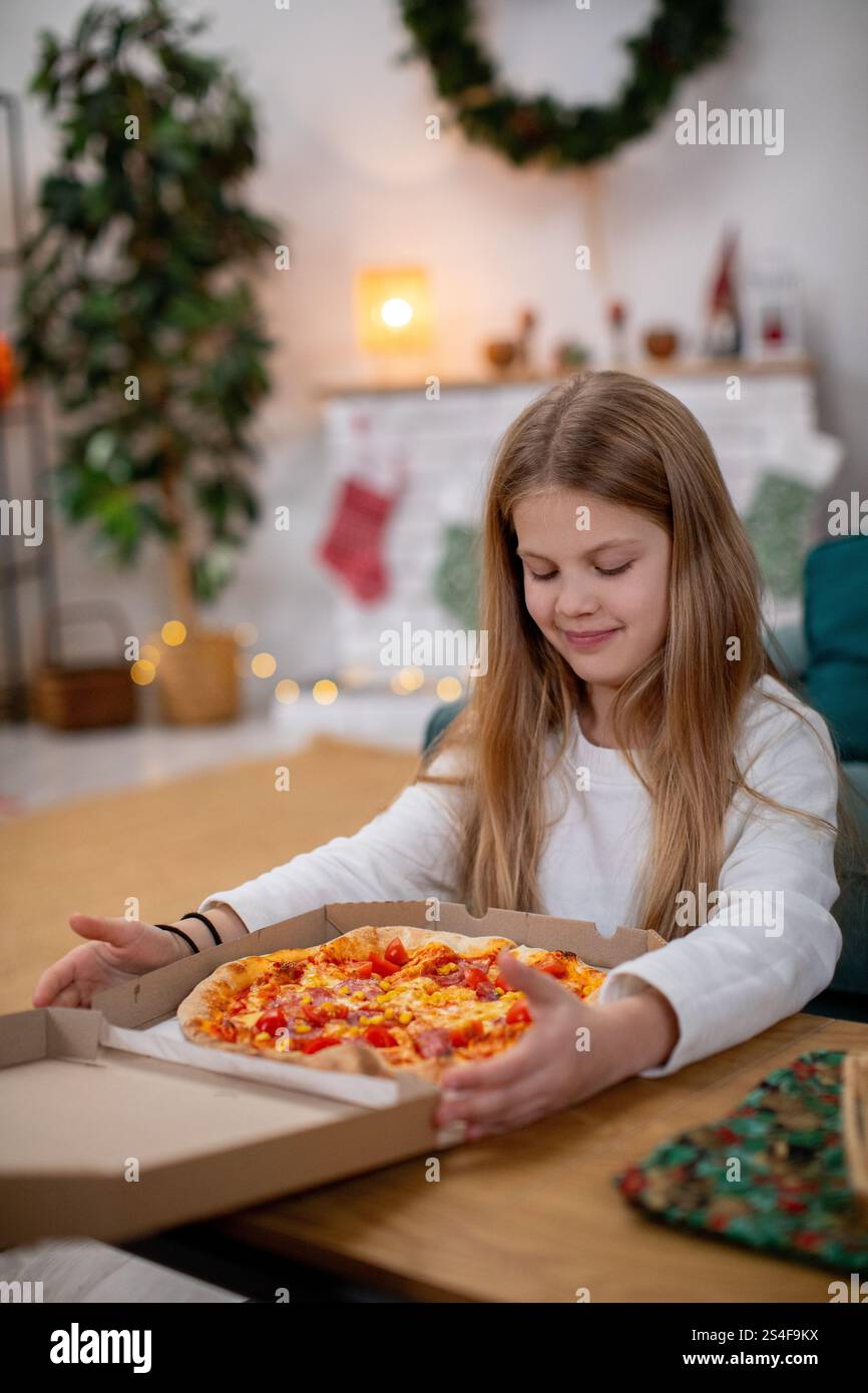 Experience the Festive Pizza Delight Alongside a Happy Child in a Cozy ...