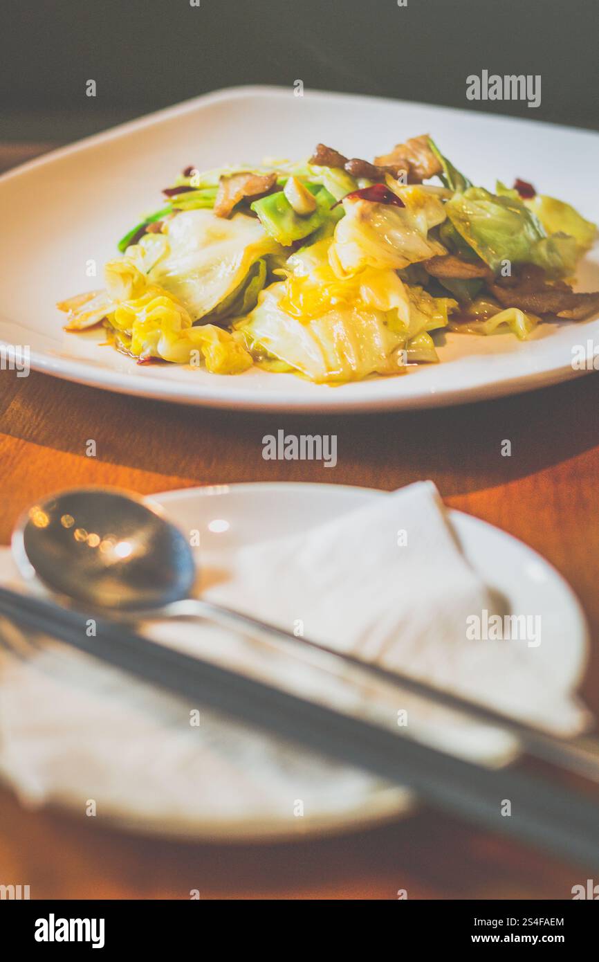 Stir Fried Cabbage with Cabbage, pork belly, dried chilli served in a ...