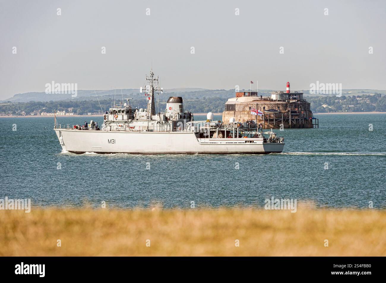 The Hunt class mine warfare vessel HMS Cattistock (M31) passing ...