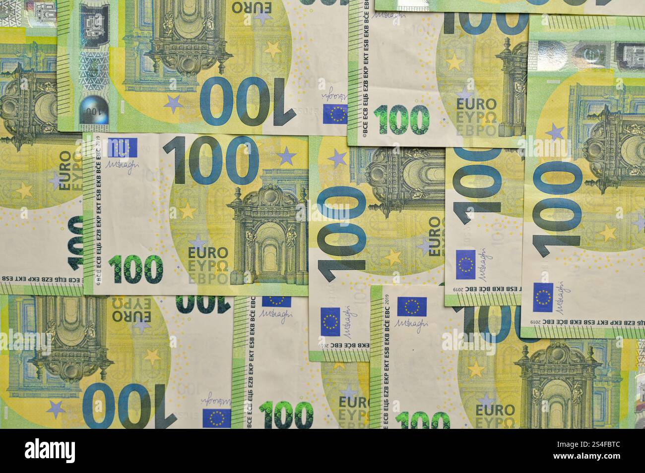 Top view 100 Euro paper cash banknotes. Copy space background ...