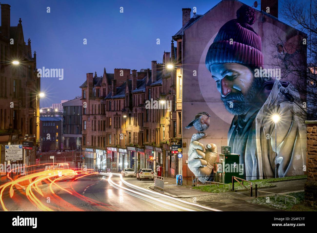 One of Glasgow's best-known murals, by street artist Smug, depicting a ...
