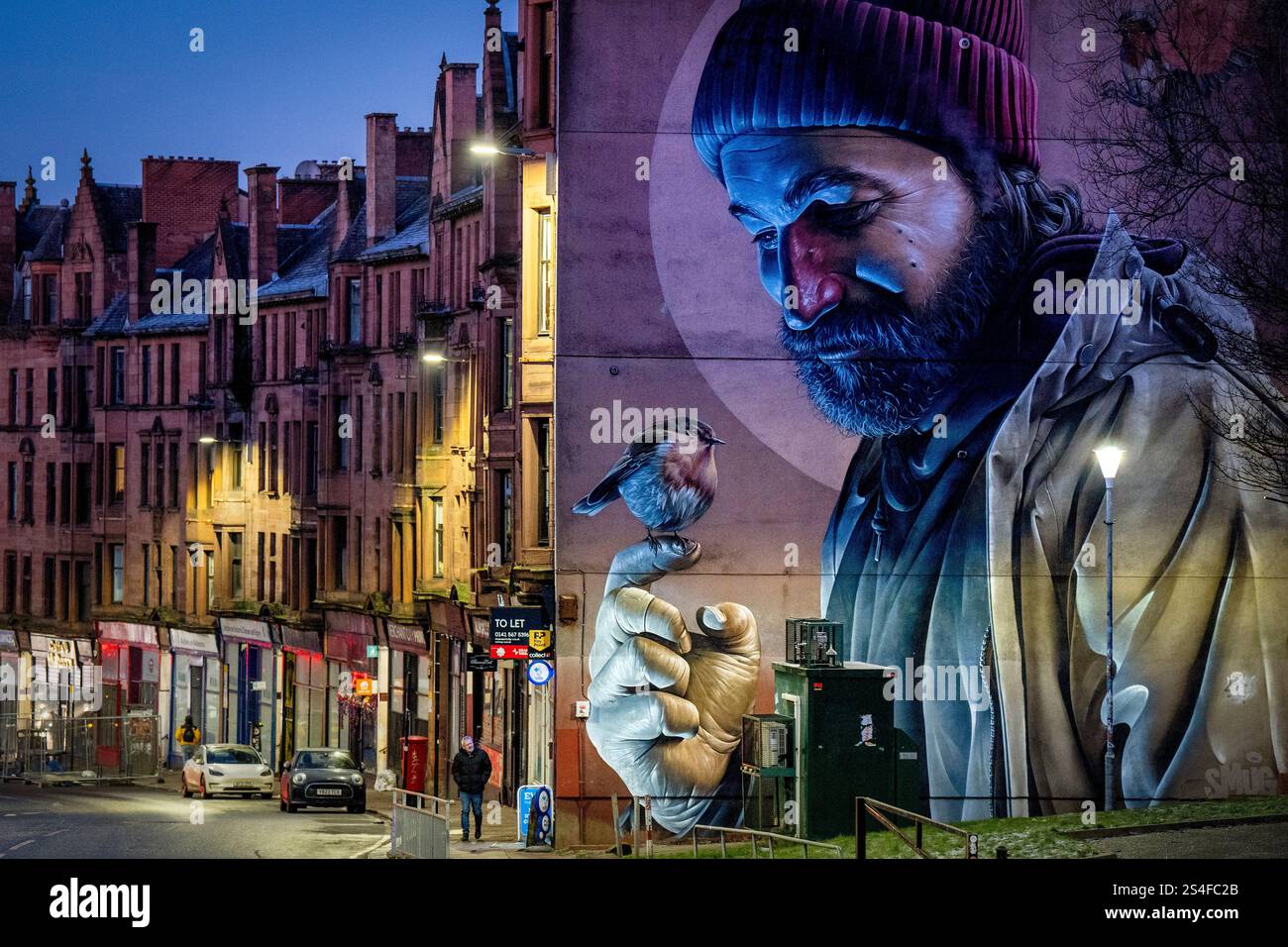 One of Glasgow's best-known murals, by street artist Smug, depicting a ...
