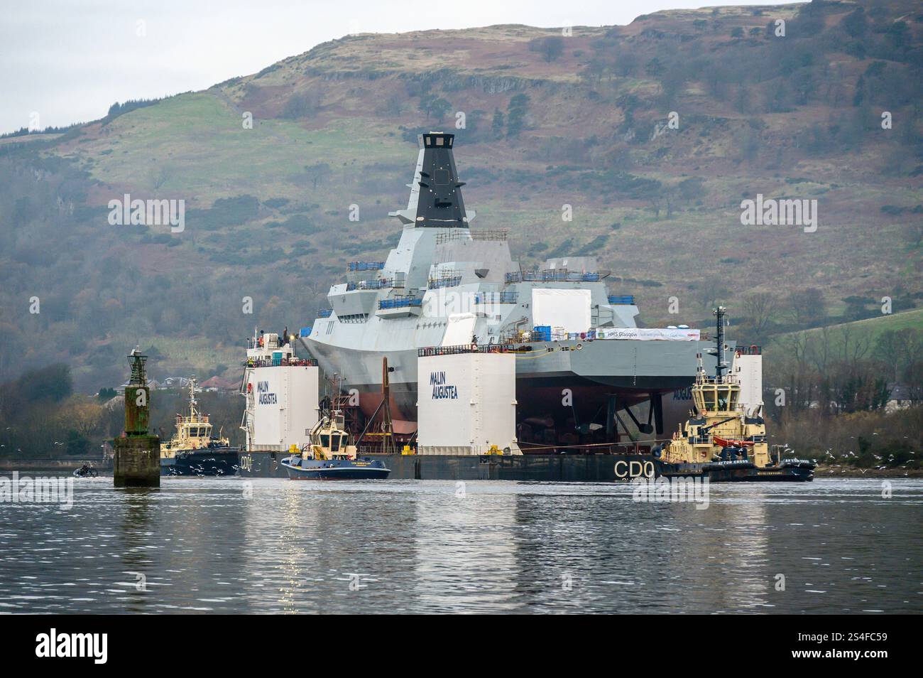 HMS Glasgow, the first of eight Type 26 frigates, heads down the River ...