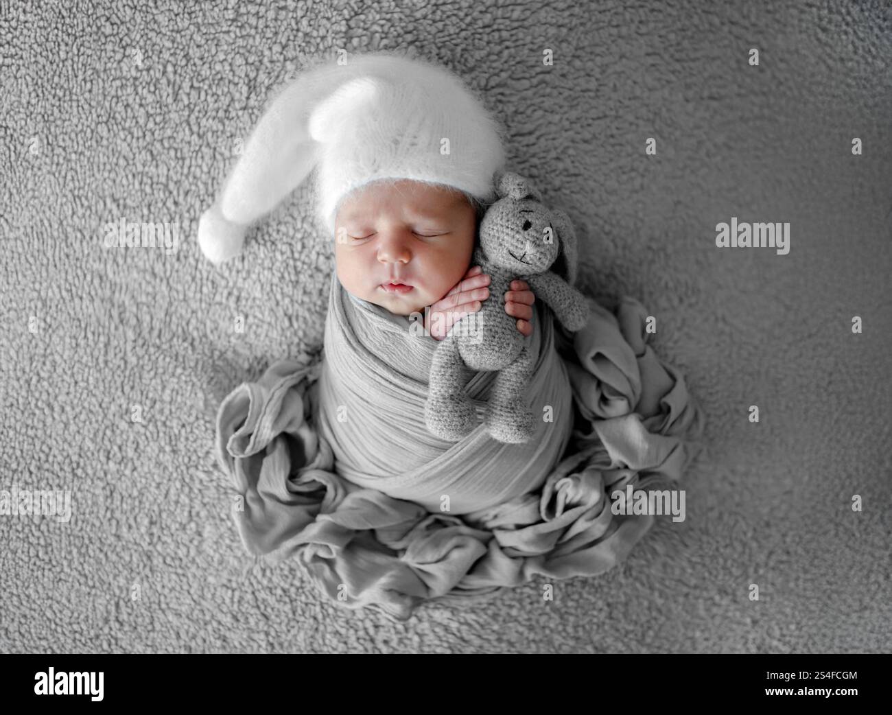 Grey wrap newborn hi-res stock photography and images - Alamy