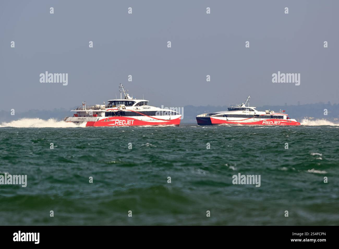 The Red Funnel high-speed passenger ferries Red Jet 6 & Red Jet 7 pass ...