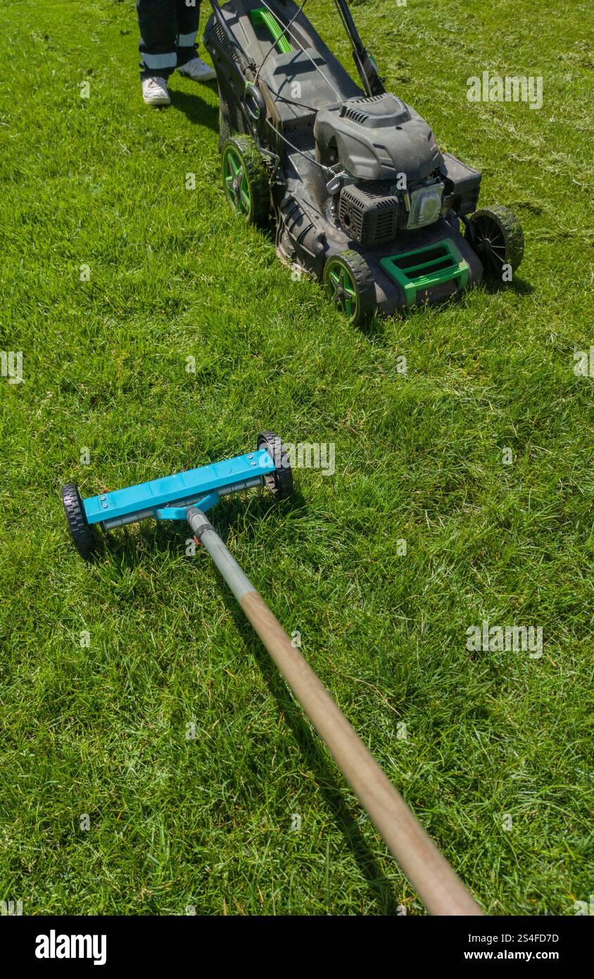 Hand scarifier with lawn mower machine at bottom. Manual tools for lawn ...