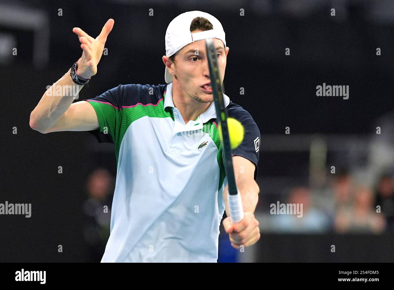 Ugo Humbert of France plays a backhand return to Matteo Gigante of ...