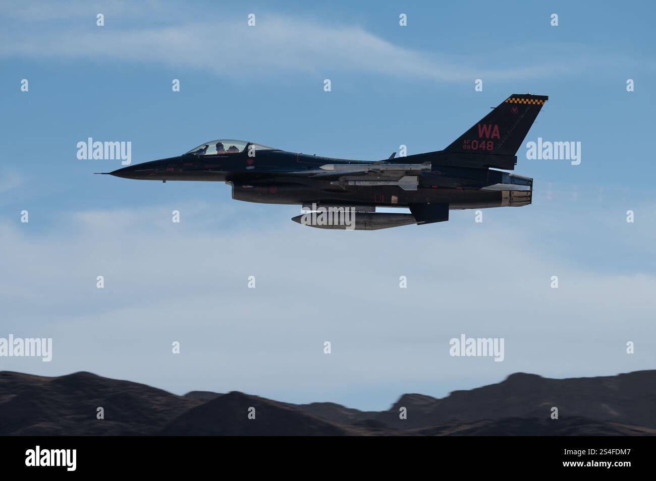 An F-16 Fighting Falcon assigned to the 64th Aggressor Squadron, Nellis ...