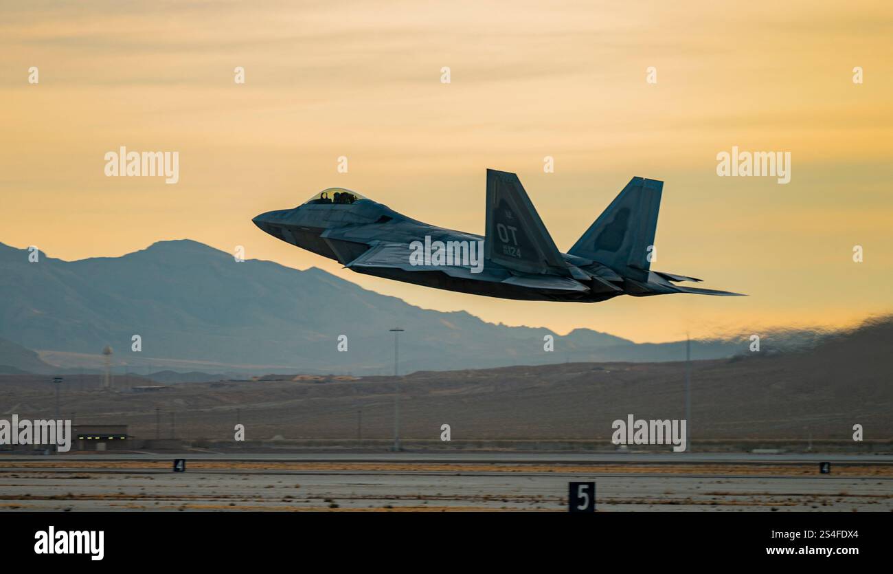 An F-22 Raptor fighter jet assigned to the 422nd Test and Evaluation ...