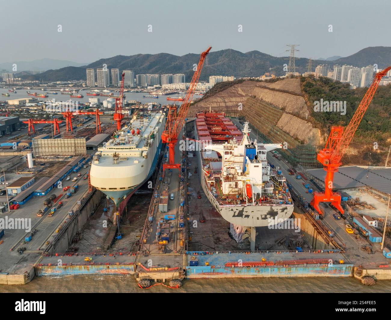 Zhoushan, China. 12th Jan, 2025. Workers repair a ship at a ship repair ...