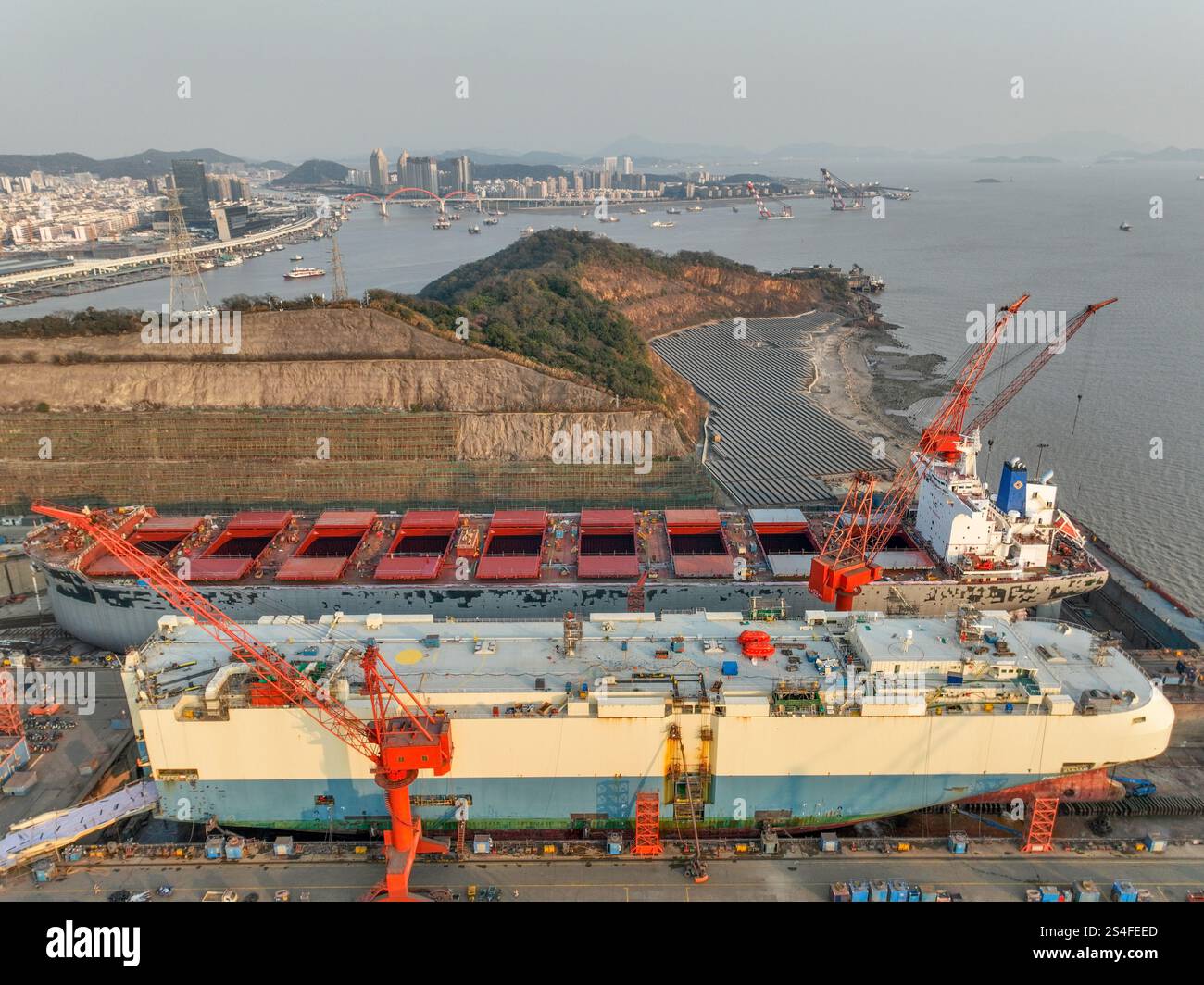 Zhoushan, China. 12th Jan, 2025. Workers repair a ship at a ship repair ...