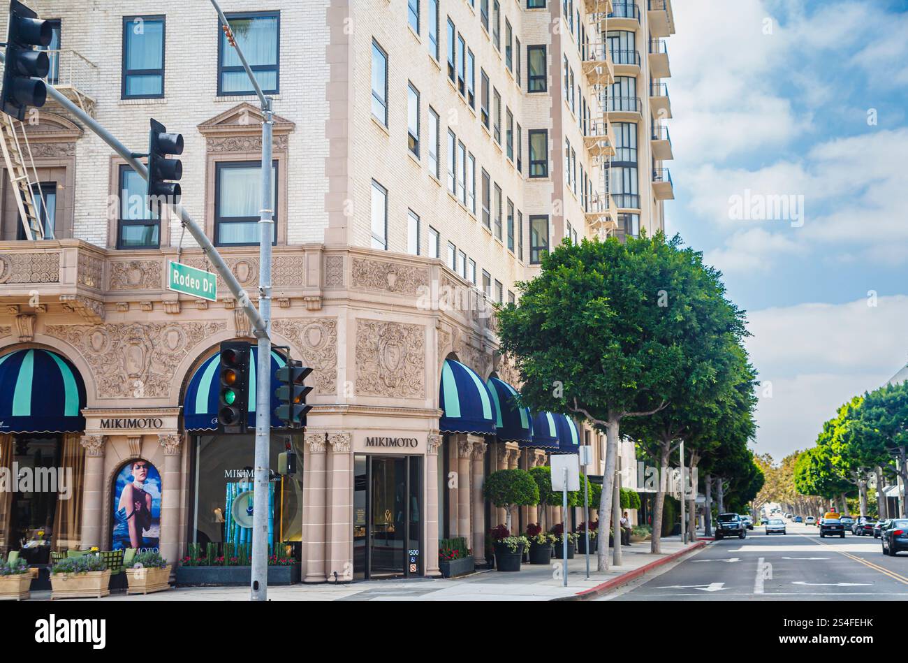 View along tree-lined Rodeo Drive in Beverly Hills, Los Angeles ...