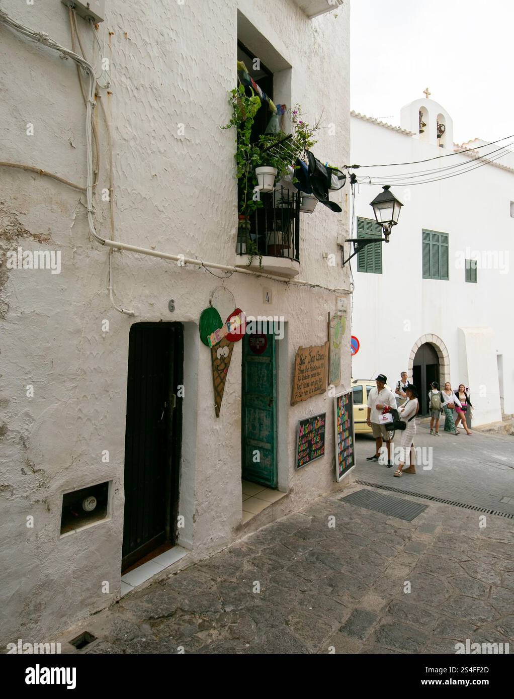 Streets and views of the ancient walled citadel of Dalt Vila, a UNESCO ...