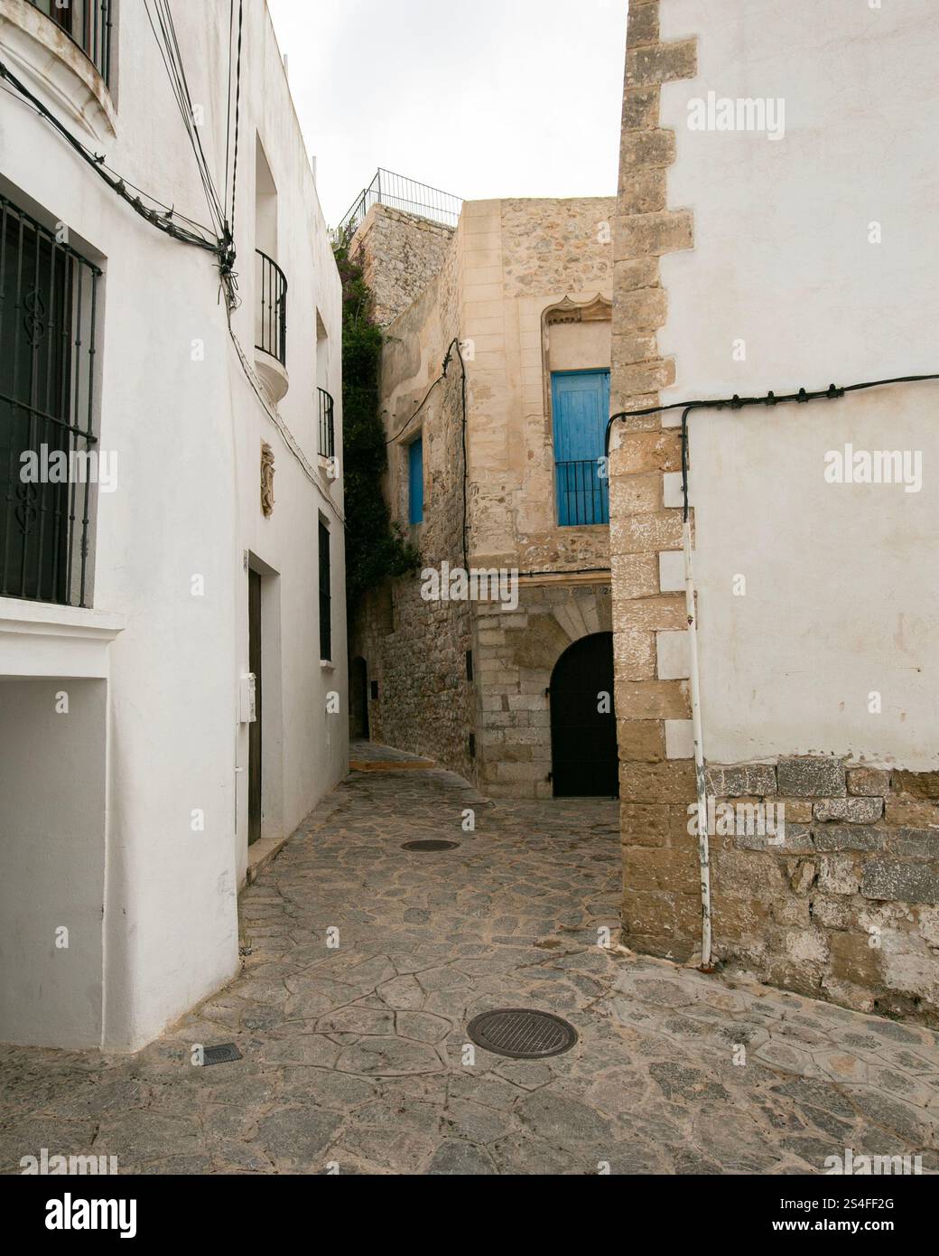 Streets and views of the ancient walled citadel of Dalt Vila, a UNESCO ...