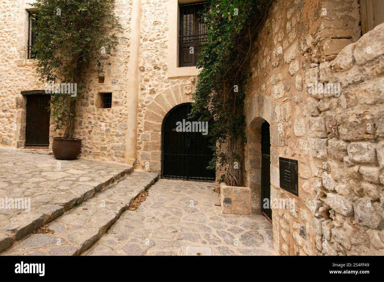 Streets and views of the ancient walled citadel of Dalt Vila, a UNESCO ...