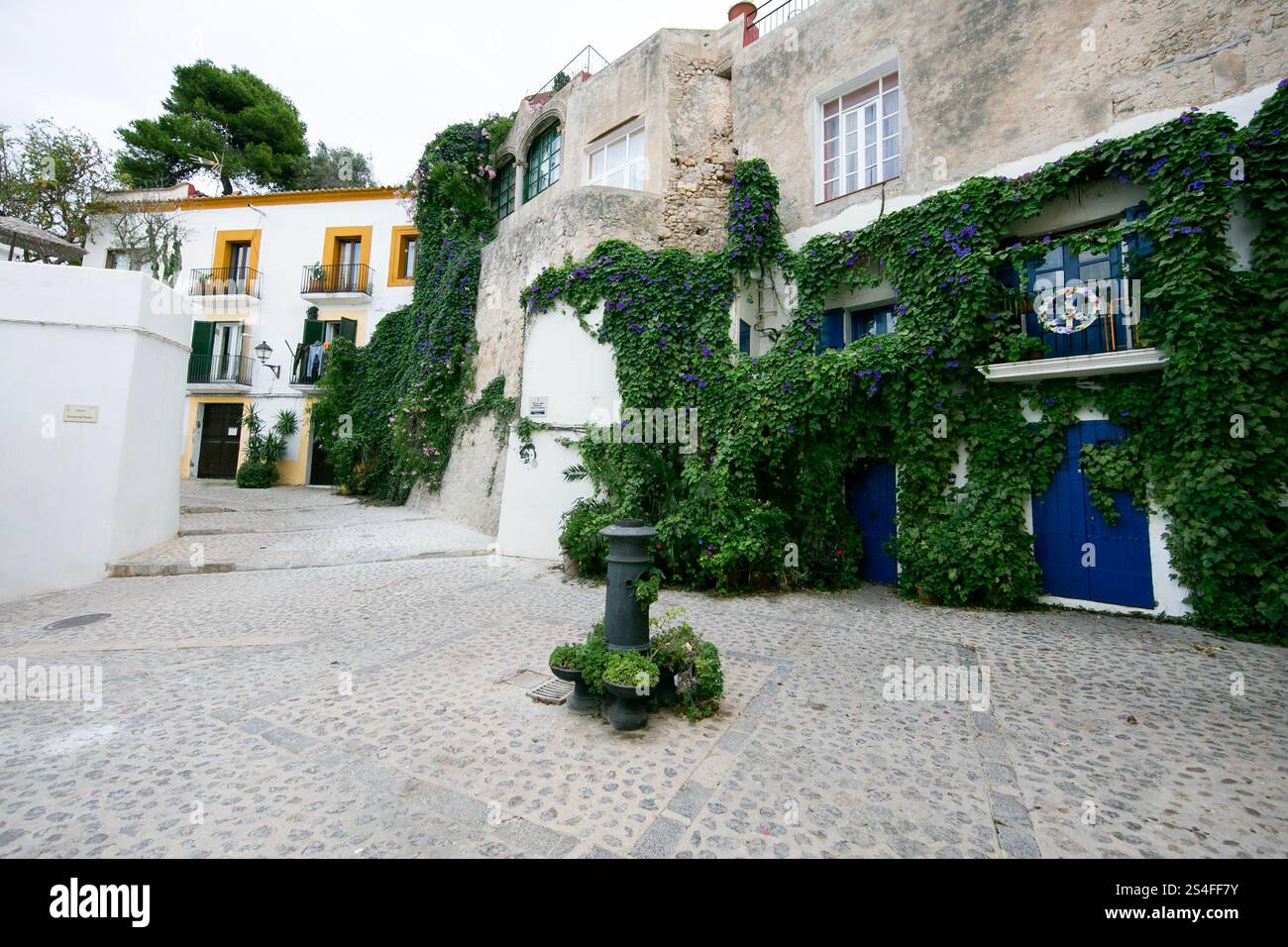 Streets and views of the ancient walled citadel of Dalt Vila, a UNESCO ...