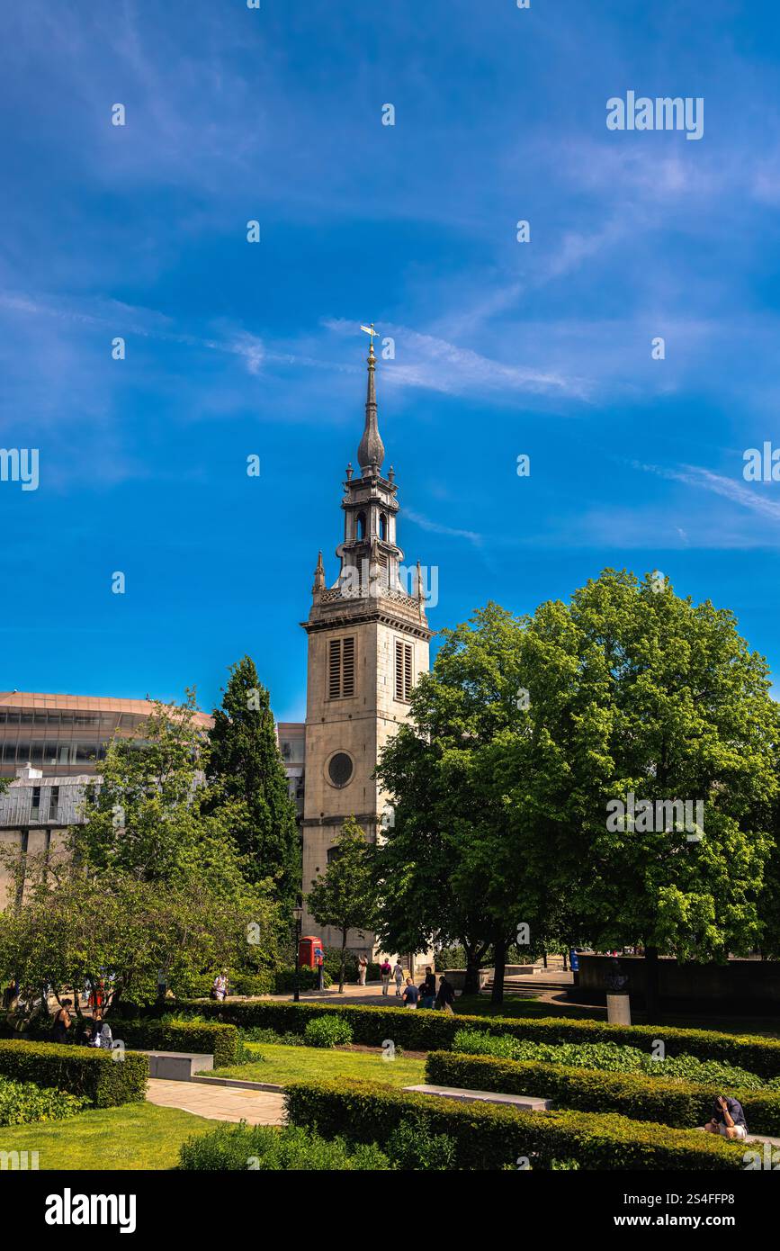view of traditional brick houses in a serene London neighborhood. The ...
