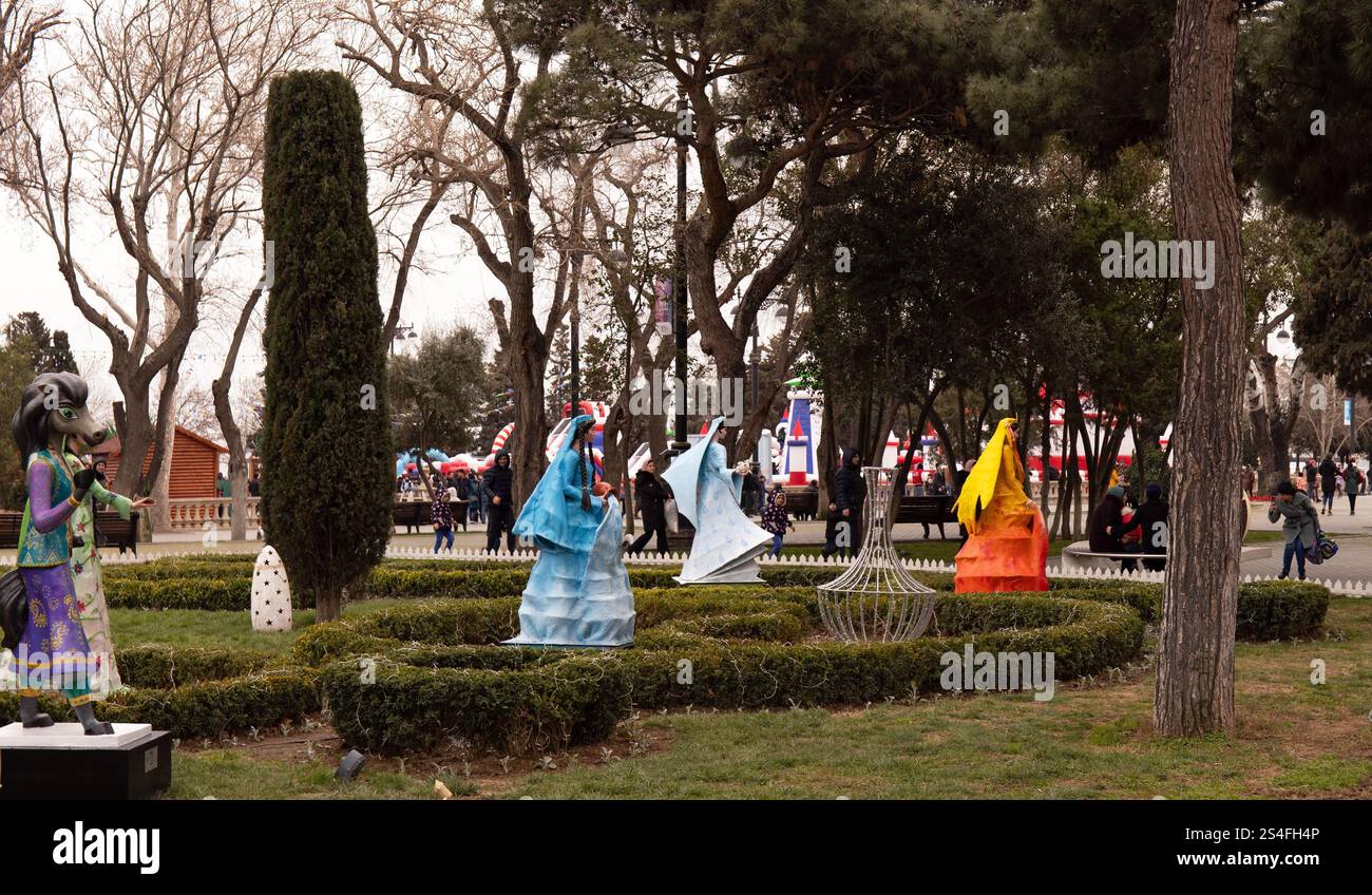 Baku. Azerbaijan. 03.22.2022. Statues of girls symbolizing the arrival ...