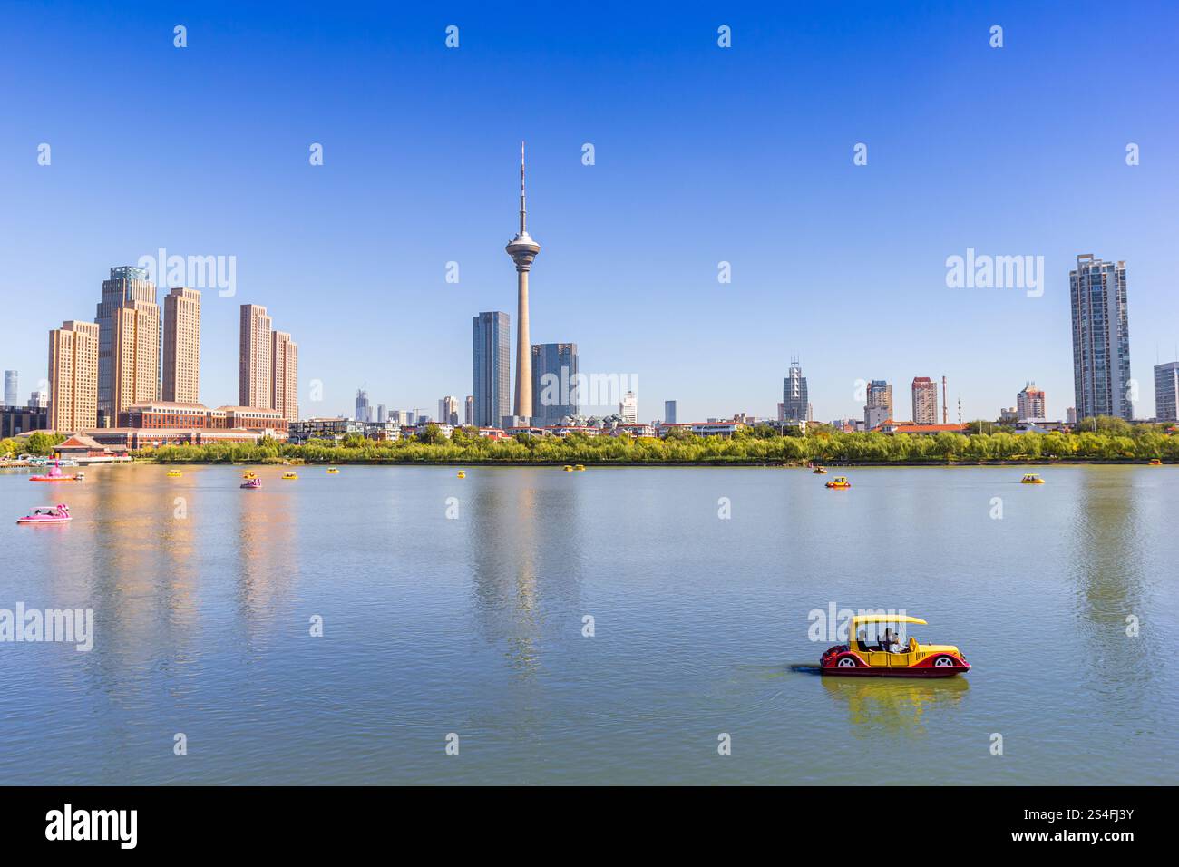 Pedal boat in the lake of the Shuishang waterpark in Tianjin, China ...