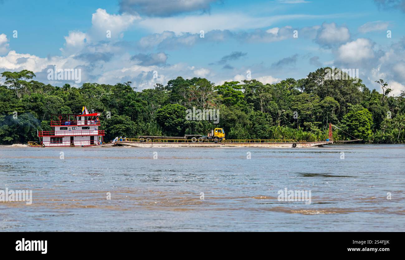 Transport boat on Napo River pushing barge with truck, Amazon ...