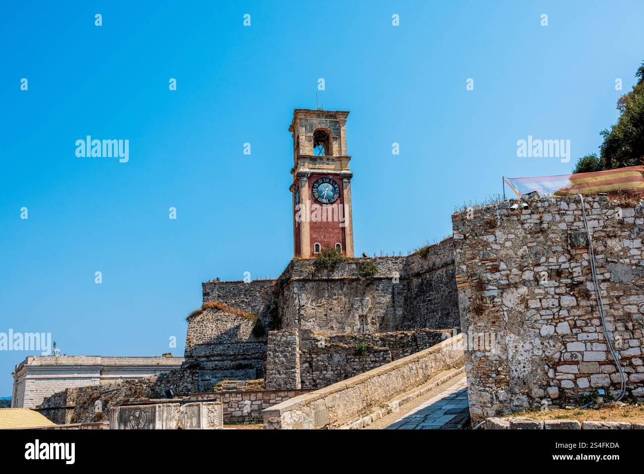 The iconic clock tower of the Old Fortress in Corfu, Greece, standing ...
