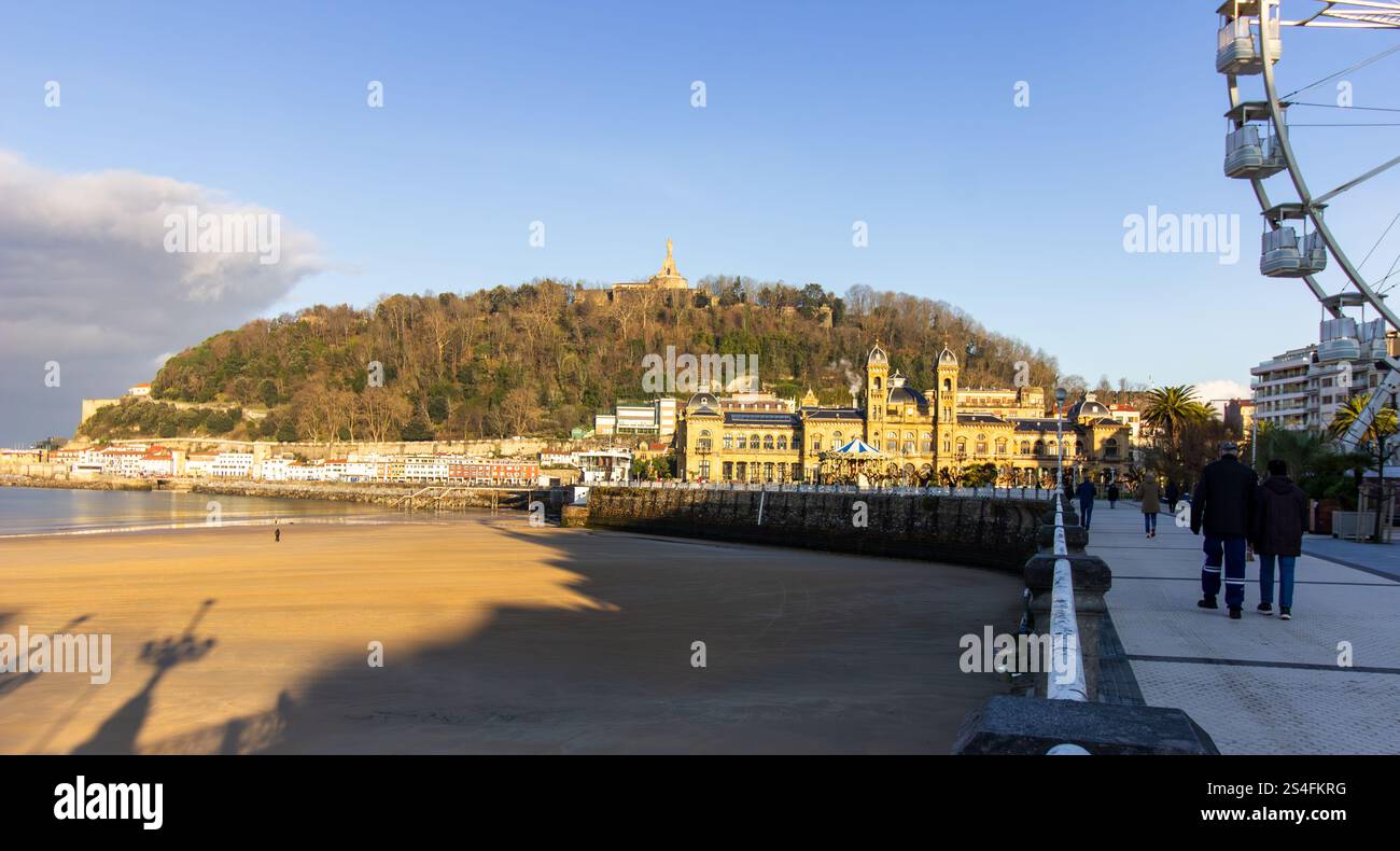 Beachfront view with City Hall, Monte Urgull, and Cristo de la Mota ...