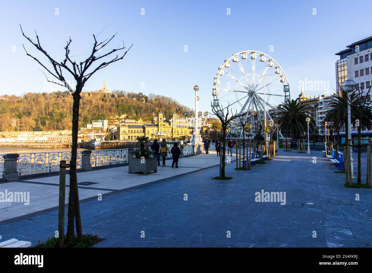 Beachfront view with City Hall, Monte Urgull, and Cristo de la Mota ...
