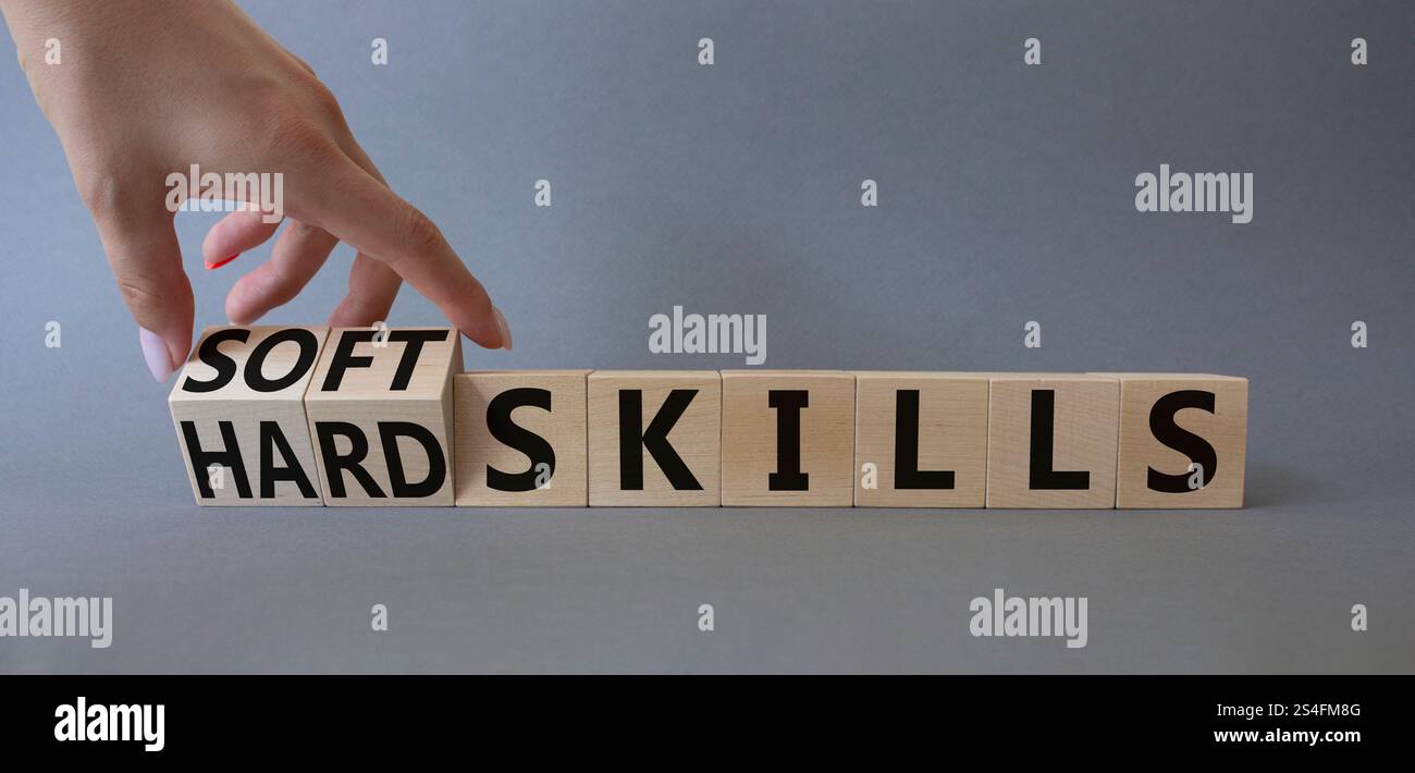 Soft Skills and Hard Skills symbol. Hand turns a cube and changes the ...