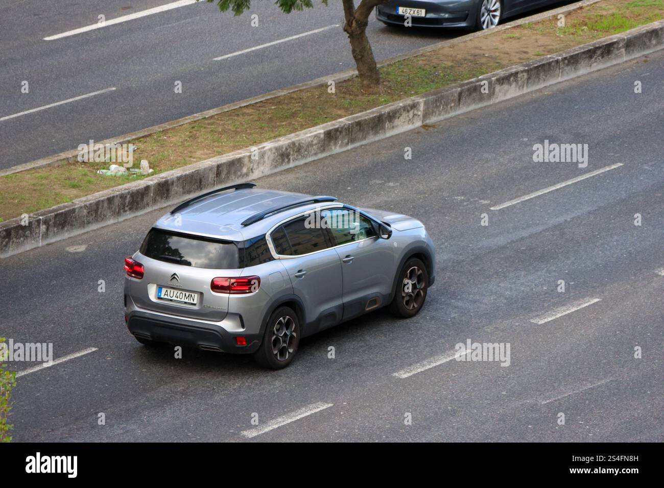 Modern silver citroen c5 aircross driving on asphalt road Stock Photo ...