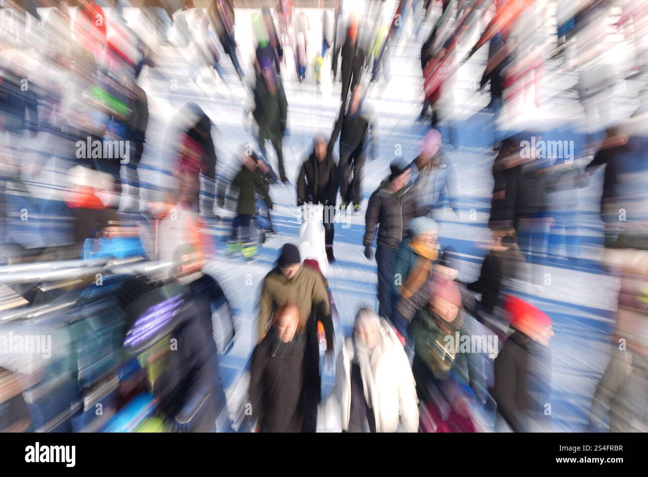 Hamburg, Germany. 12th Jan, 2025. Visitors skate on the ice rink in the ...