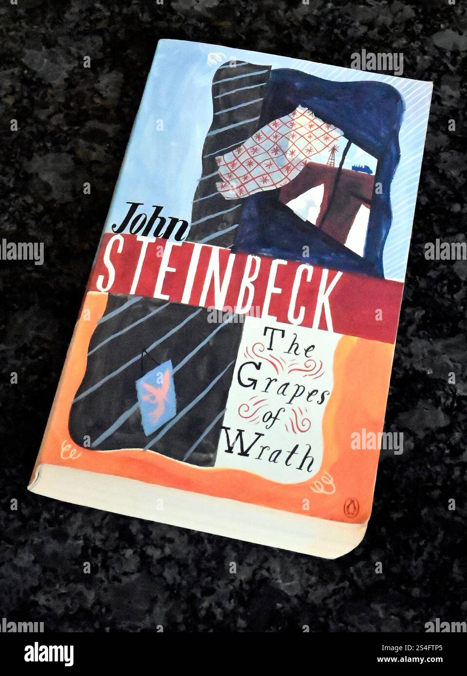Book cover "The Grapes of Wrath" by John Steinbeck Stock Photo - Alamy