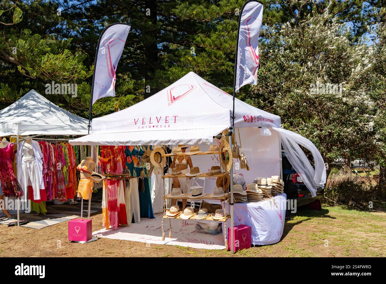 Market stall Velvet swimwear selling swimming clothing and hats, Palm ...