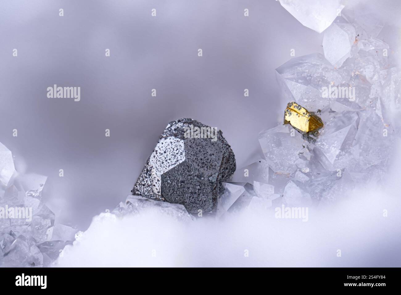 grey Tennantite crystal with chalcopyrite on quartz. Specimen from ...