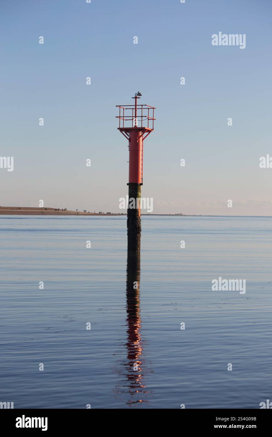 Beach marker maritime guide off Haying island coast Stock Photo - Alamy