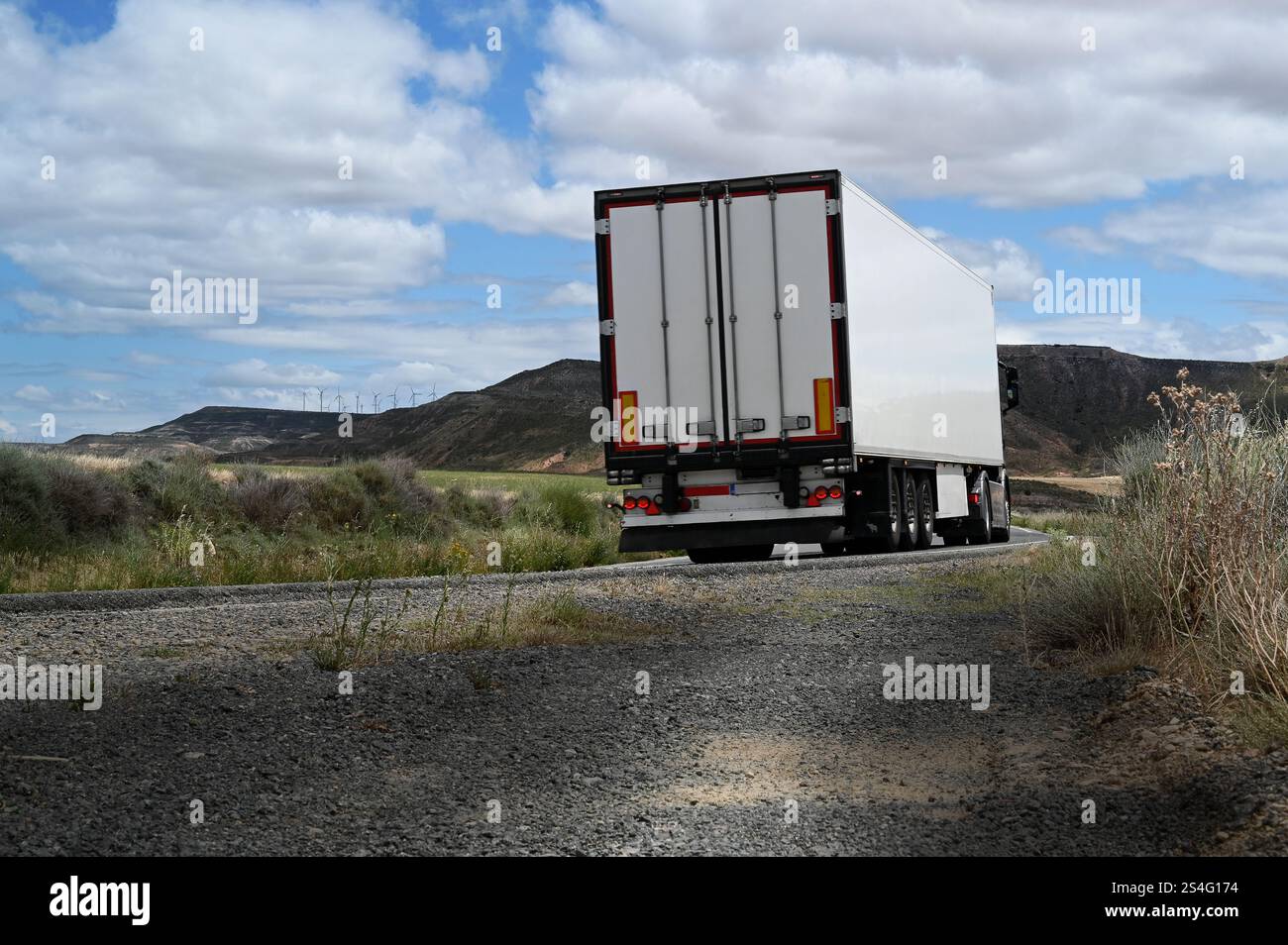 Truck lorry van of a haulage company drives on the motorway road at ...