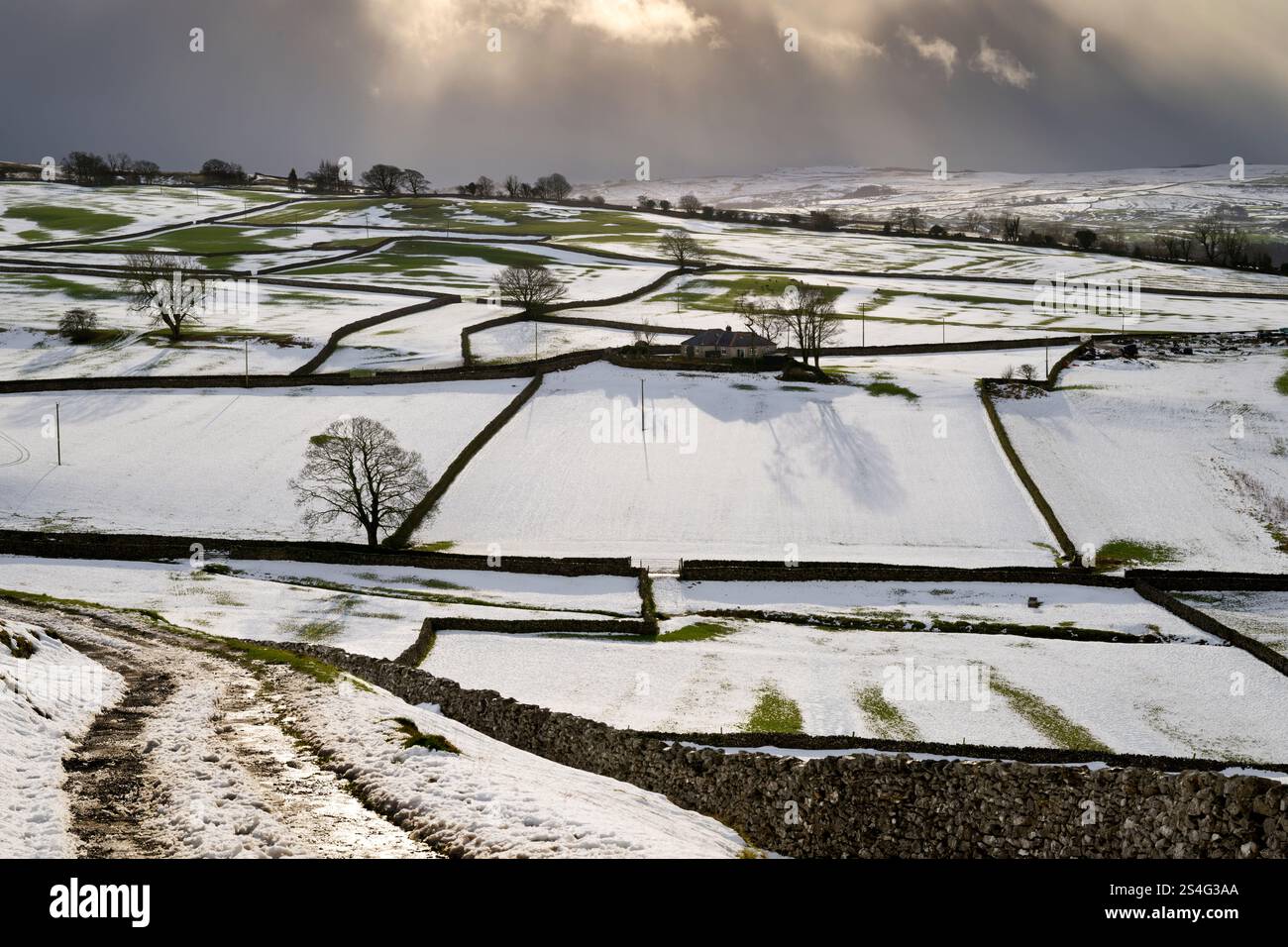 The snow-covered landscape above the village of Feizor near Settle ...